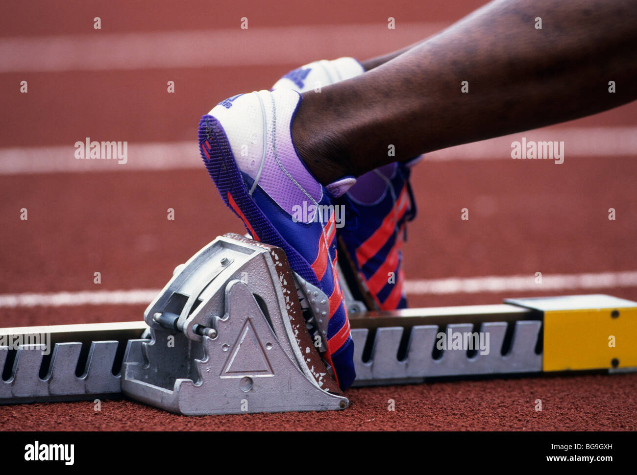 Sprinter in the starting block Stock Photo - Alamy