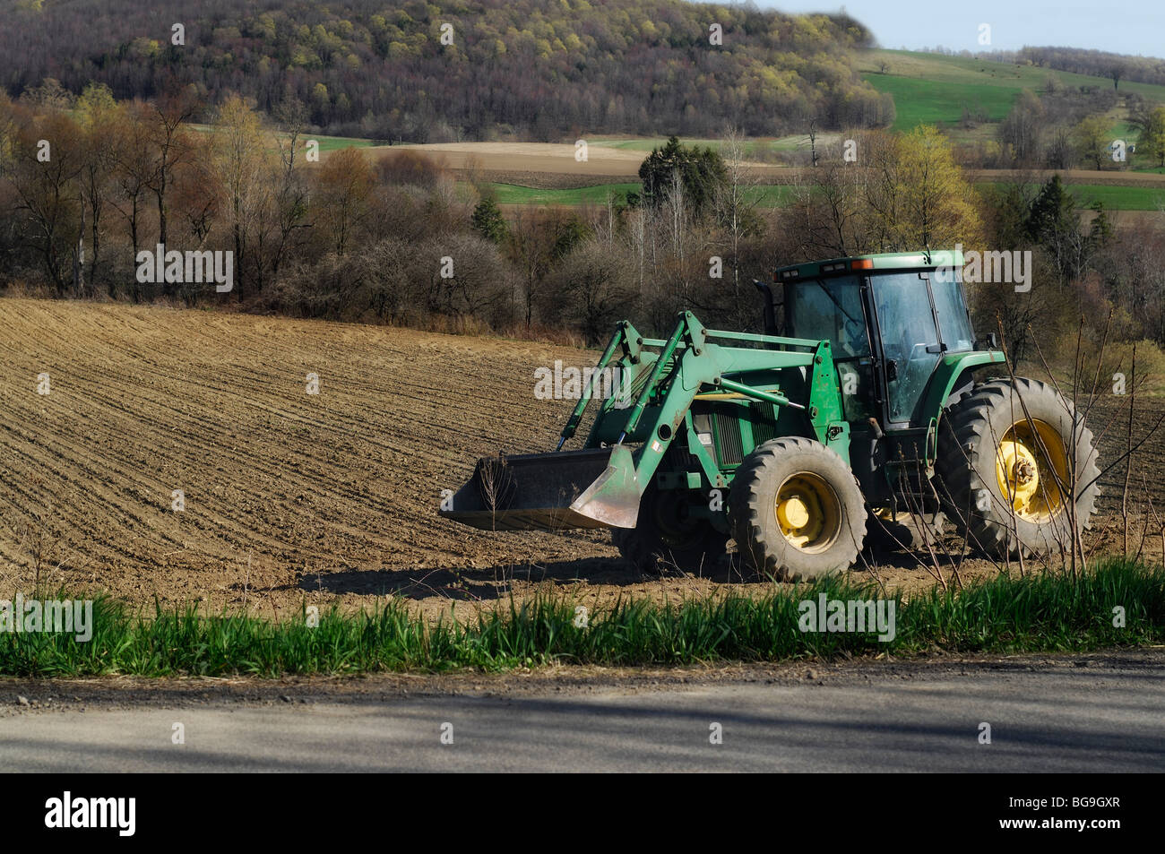 tractor in field Stock Photo - Alamy