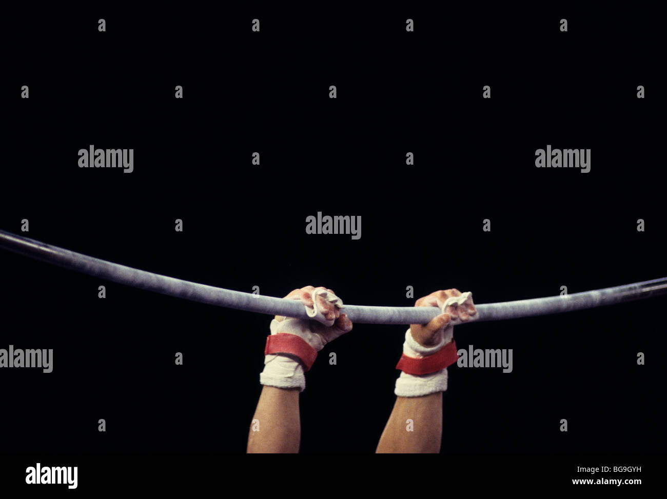 gymnast performing on high bar Stock Photo - Alamy