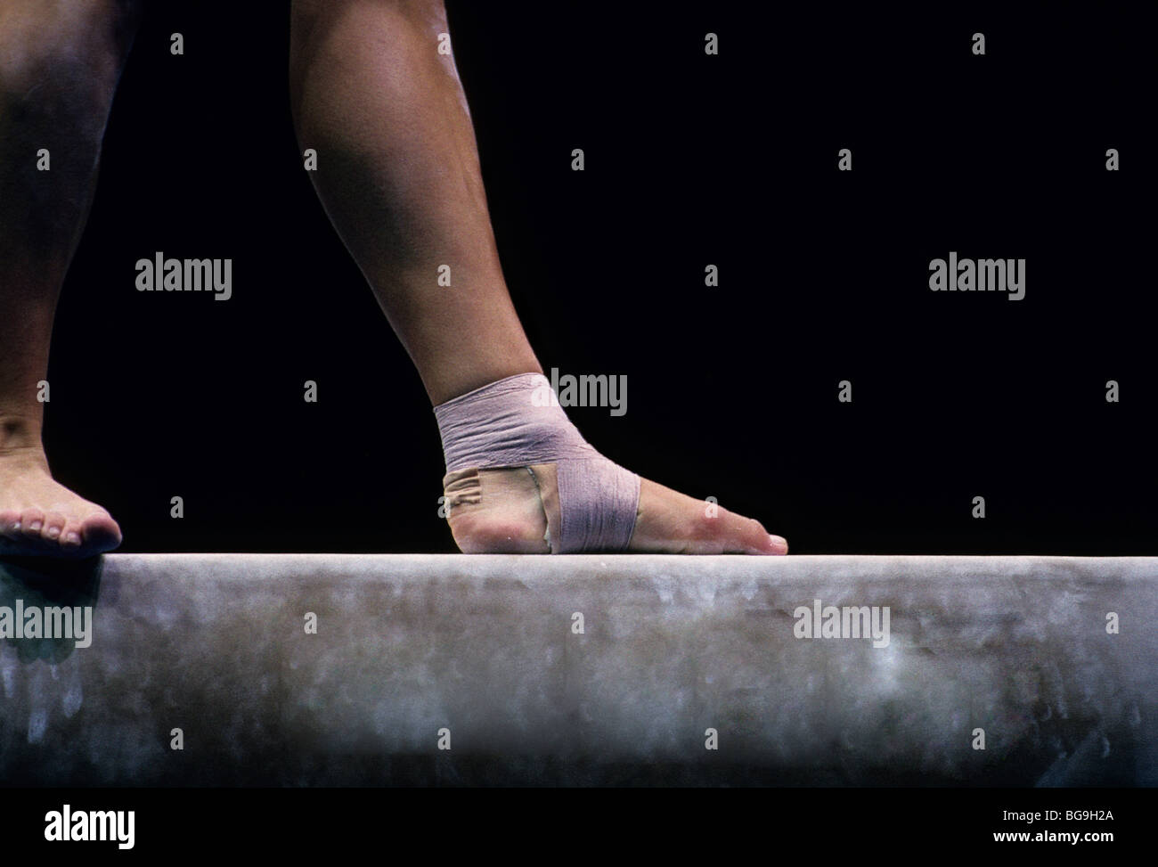gymnast performing on beam Stock Photo - Alamy