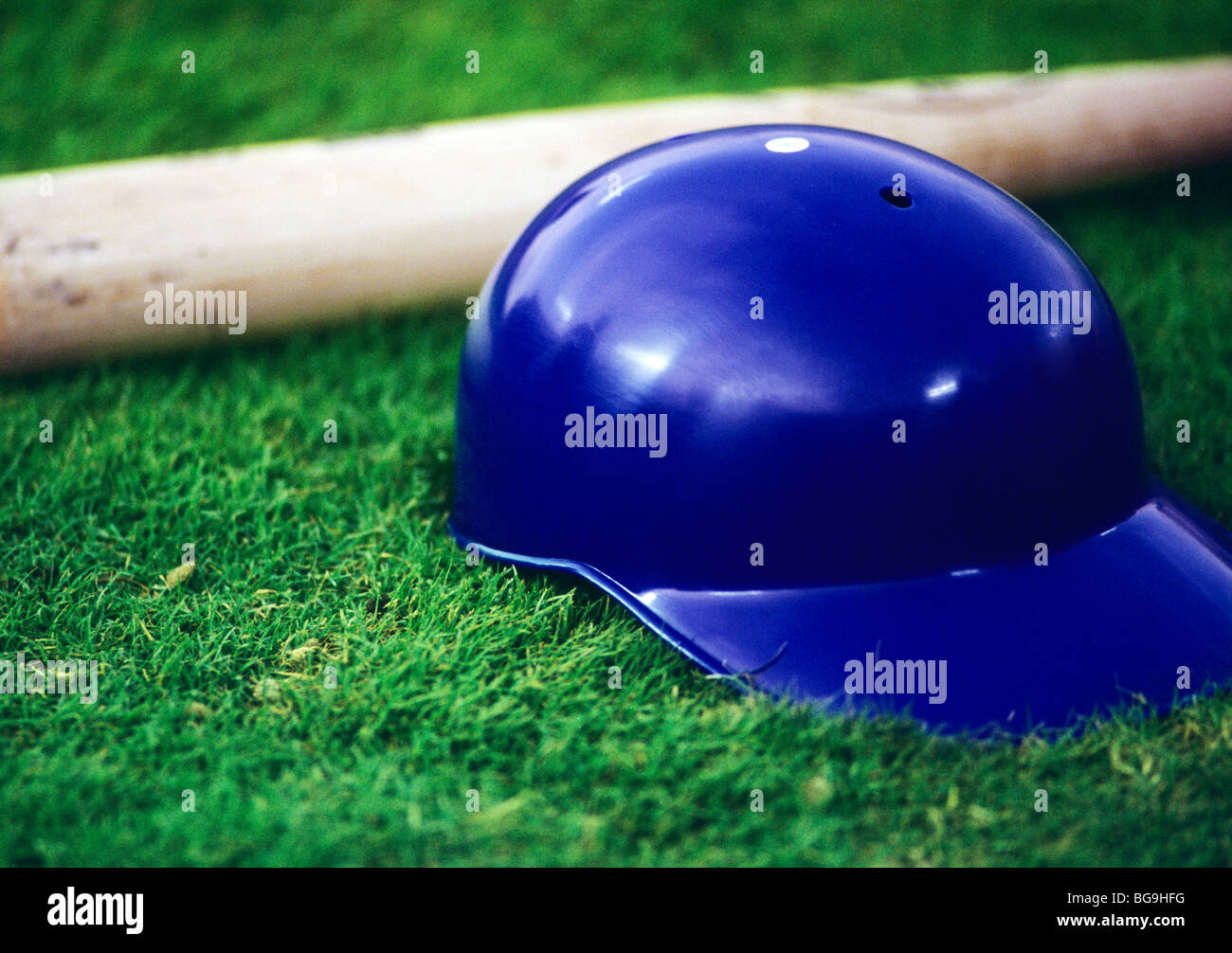 Bat and helmet on the pitch hi-res stock photography and images - Alamy