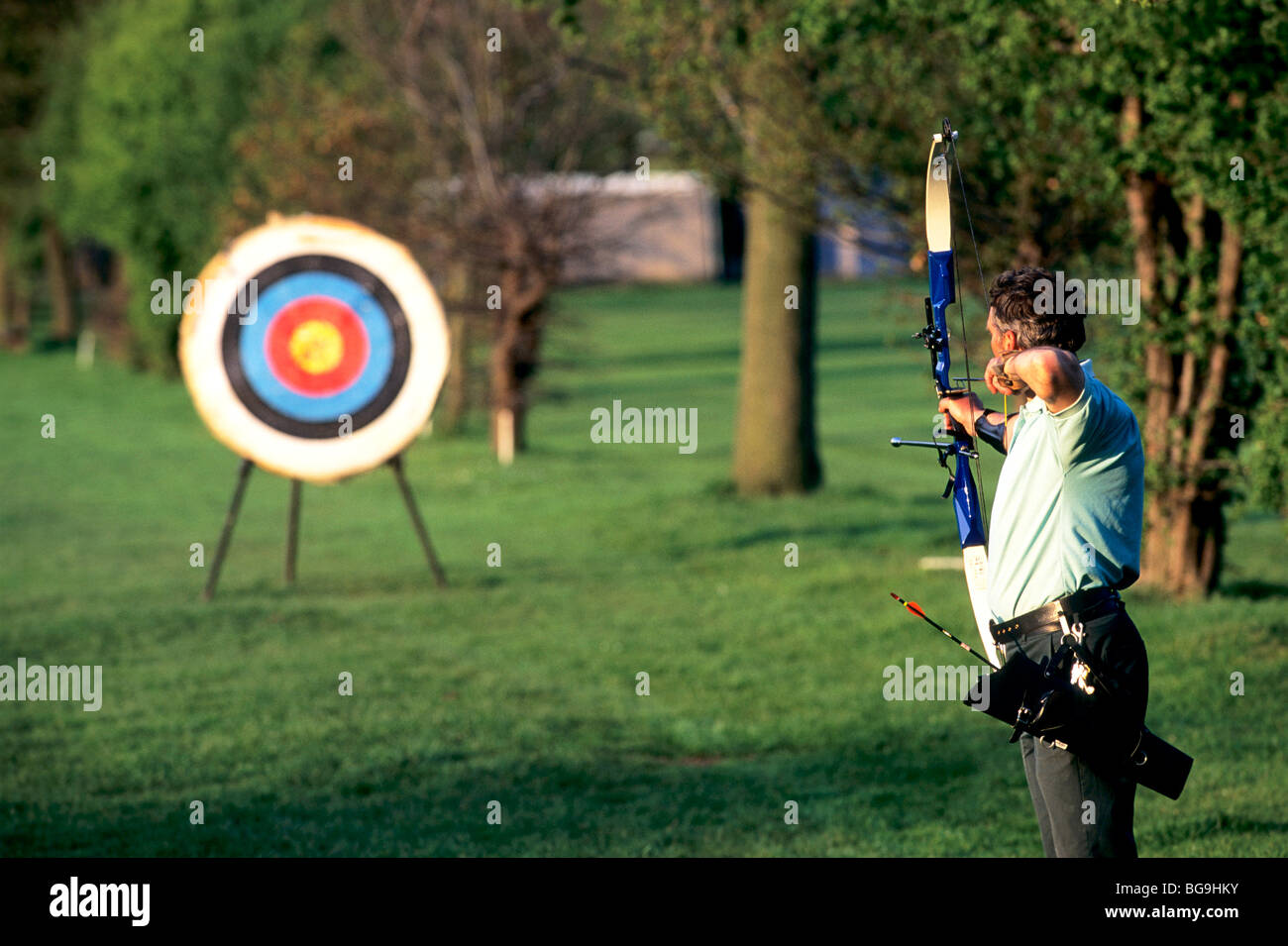 Male archer taking aim at a target Stock Photo - Alamy Male archer taking aim at a target Stock Photo - Alamy