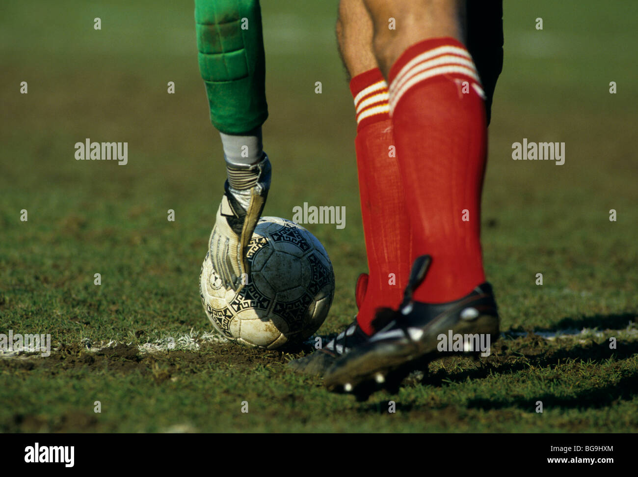 Goalkeeper placing ball on six yard line Stock Photo - Alamy