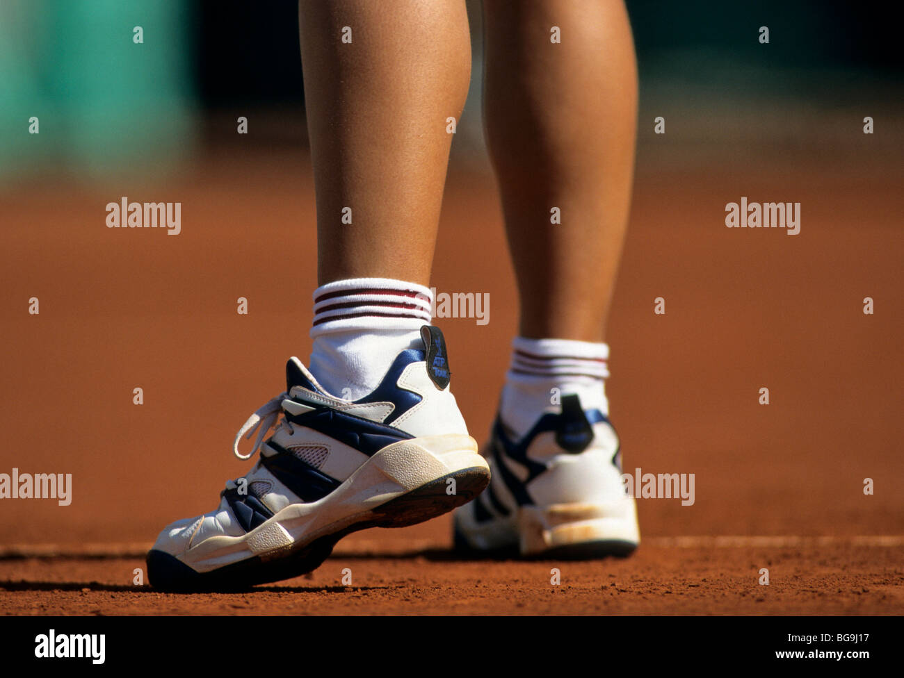 Tennis player on a clay court Stock Photo - Alamy