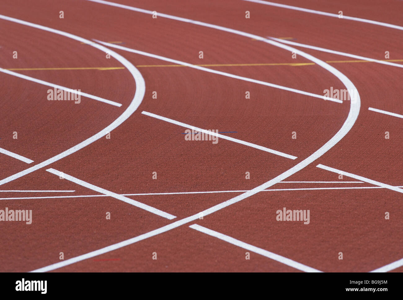 Crossing lanes on a running track Stock Photo - Alamy