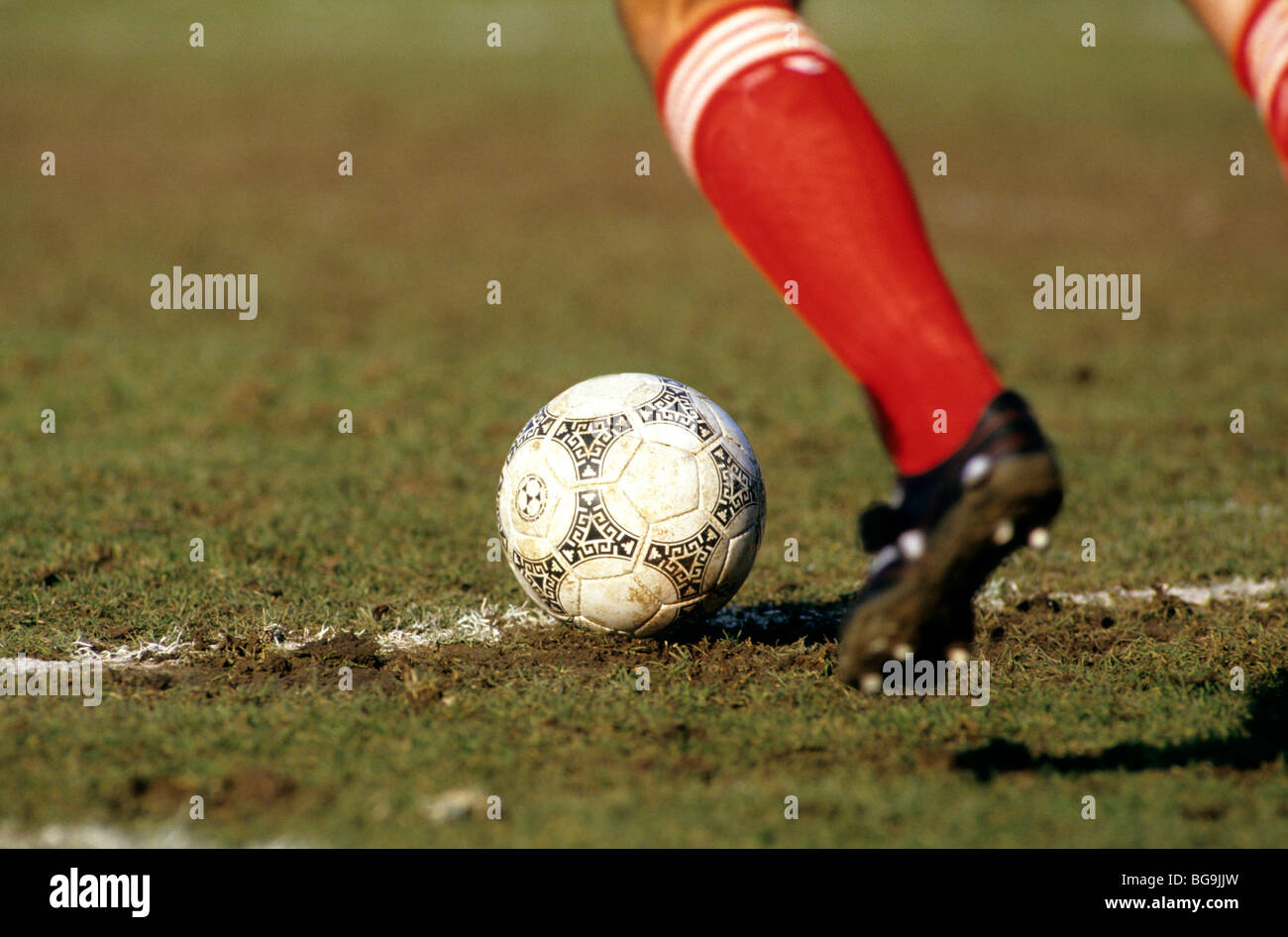 Football player about to kick a ball Stock Photo - Alamy