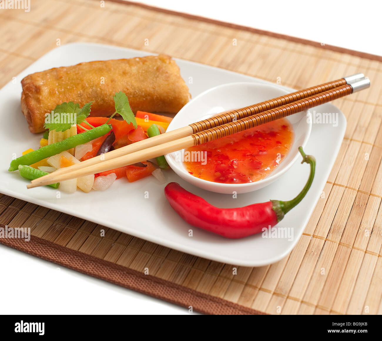 an asian spring roll and fresh vegetables Stock Photo - Alamy