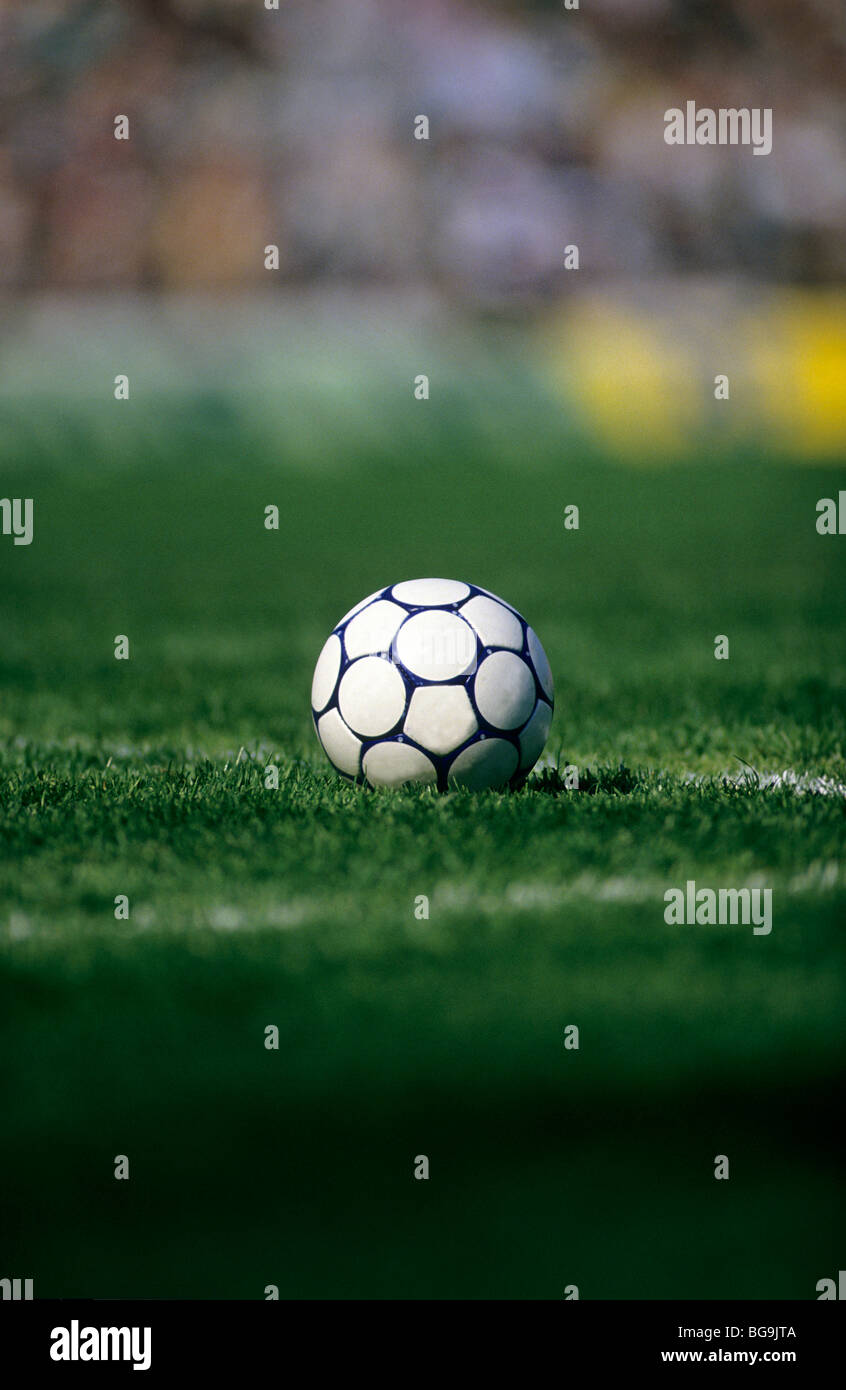 Football on a pitch Stock Photo - Alamy