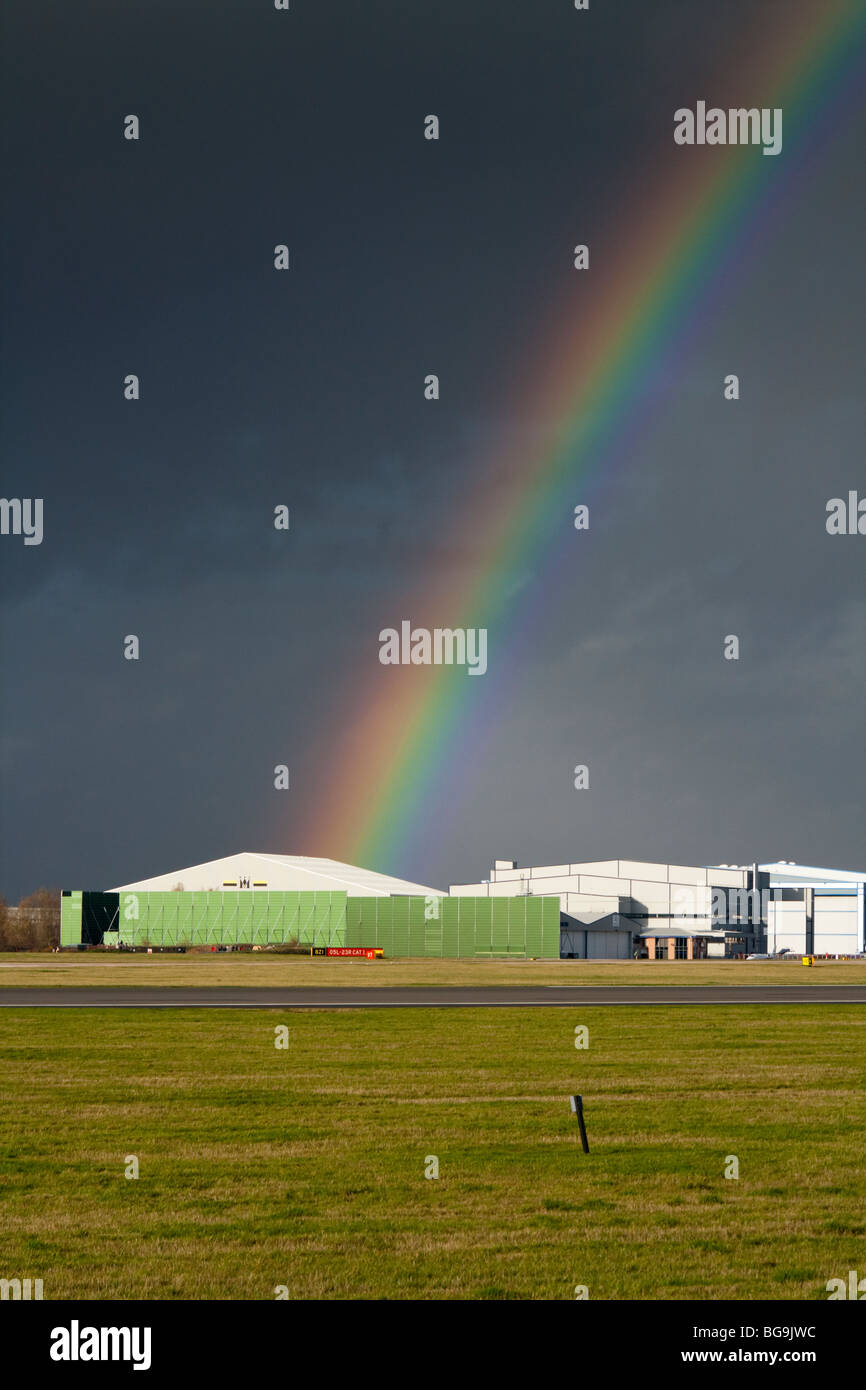 Rainbow over airport buildings at Manchester International Airport ...