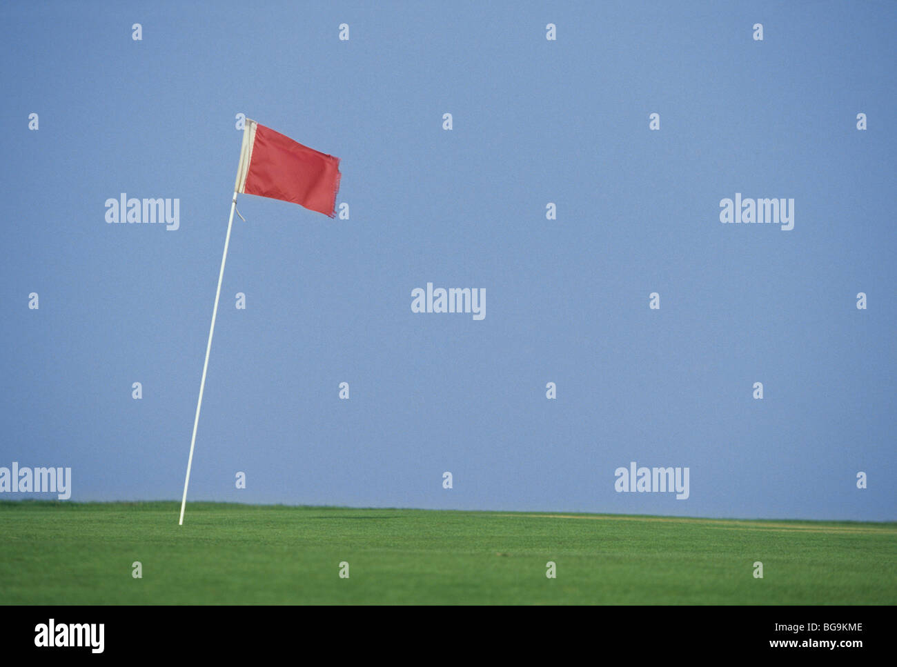 Golf flag very windy hi-res stock photography and images - Alamy