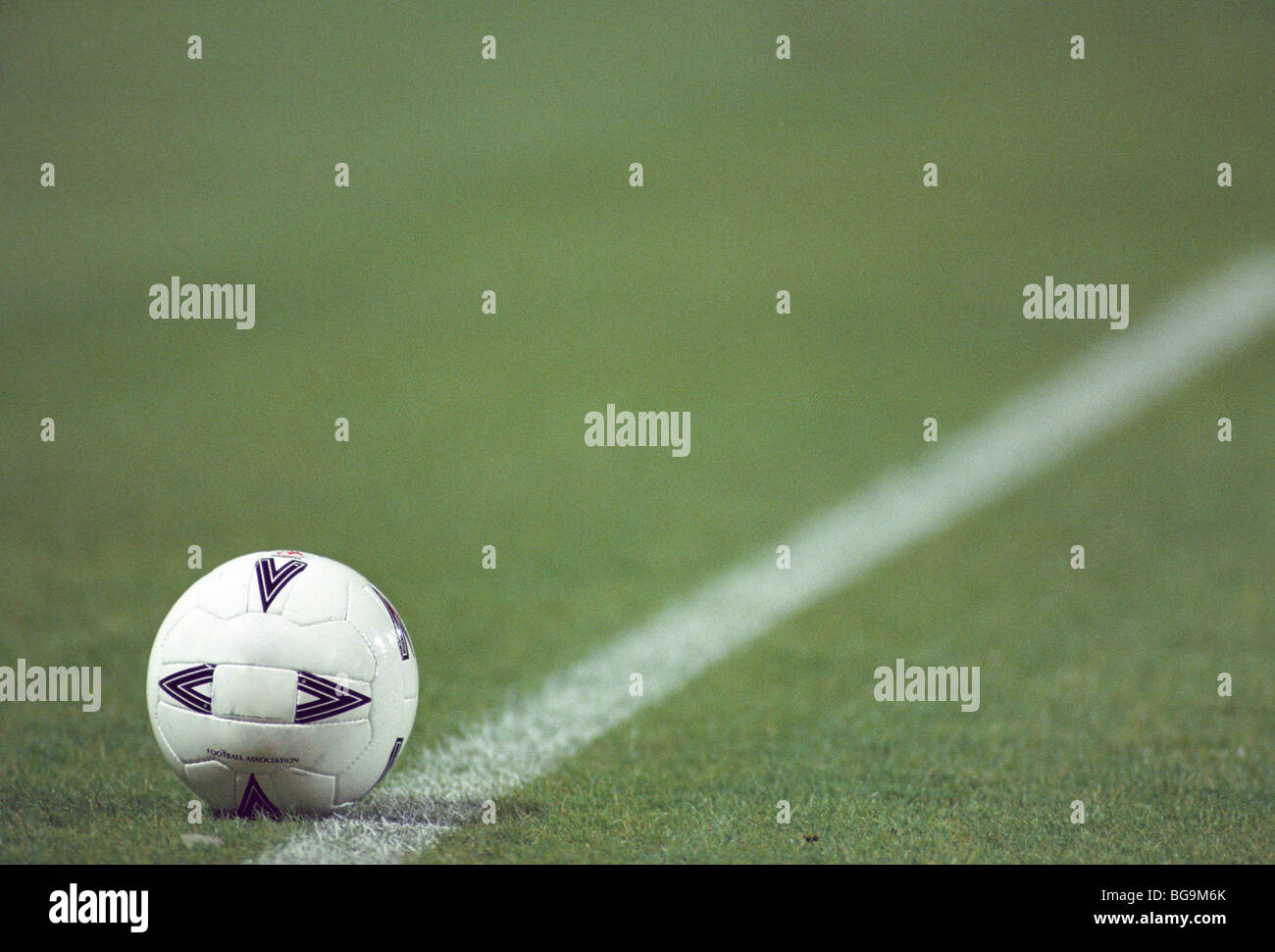 Football on a pitch Stock Photo - Alamy