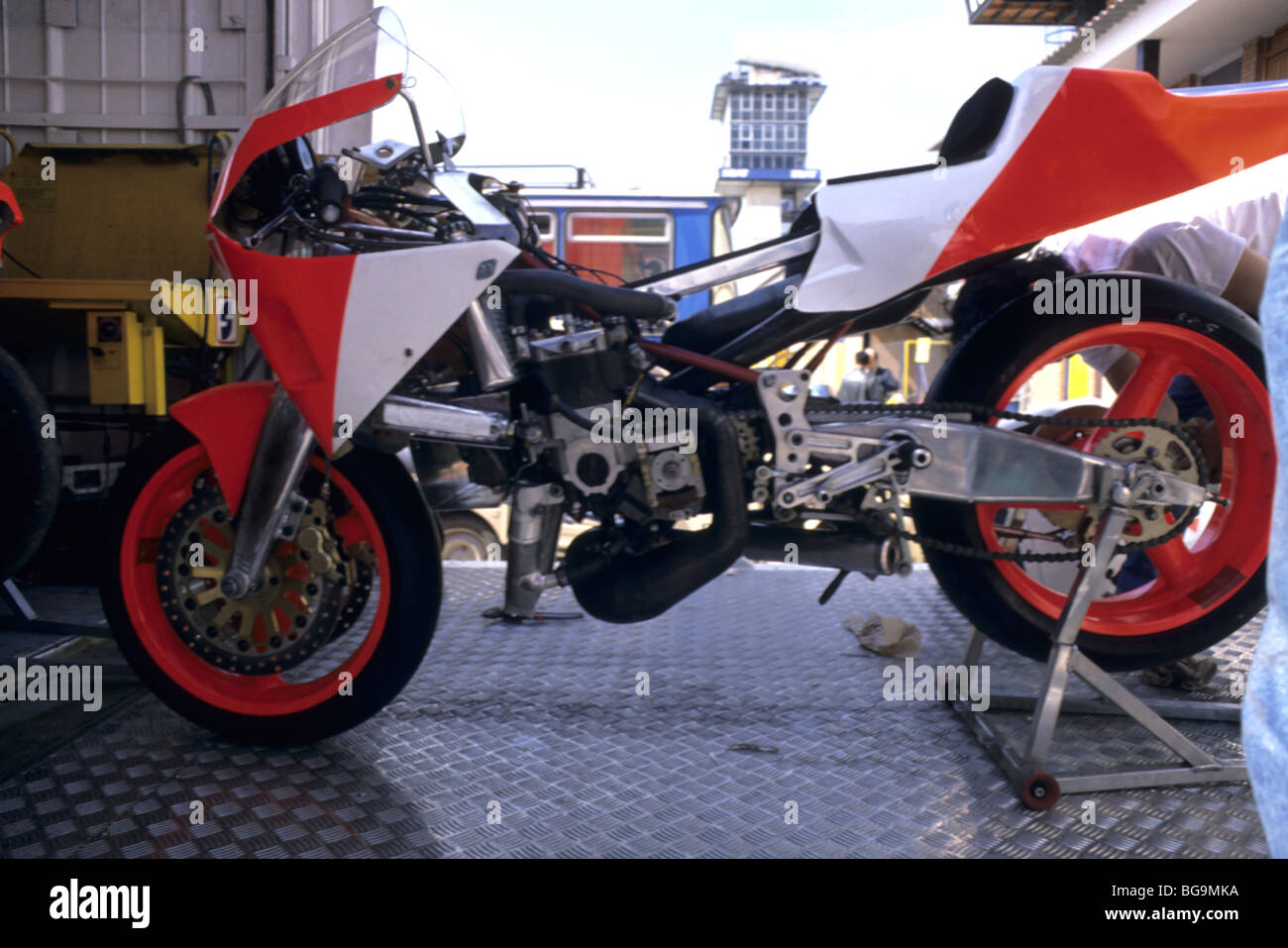 Racing Motorcycle on bike stand in pits at track Stock Photo - Alamy
