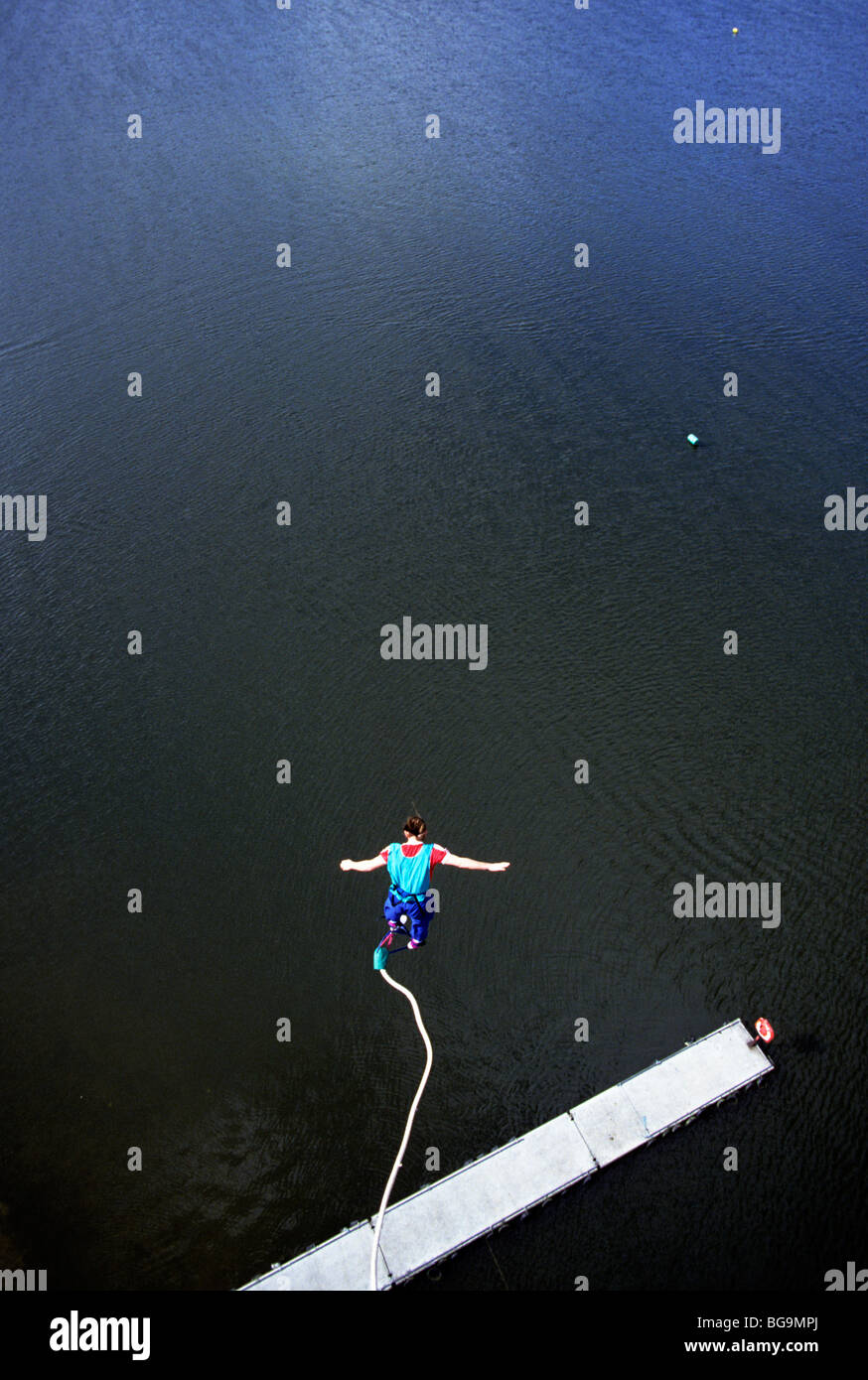 Bungee jumping over water Stock Photo - Alamy