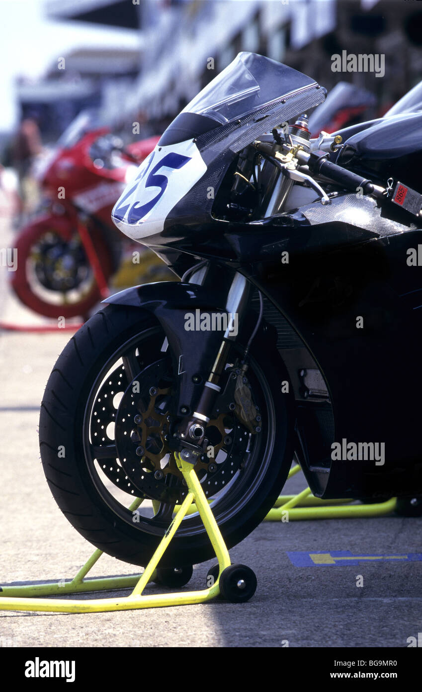 Racing Motorcycle on bike stand in pits at track Stock Photo - Alamy