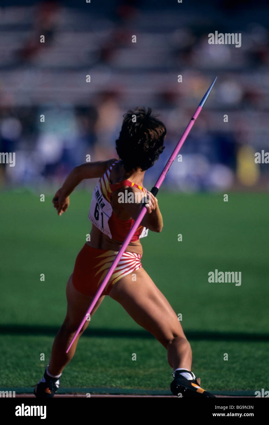 Rear View Female Athlete Throwing Javelin High Resolution Stock ...