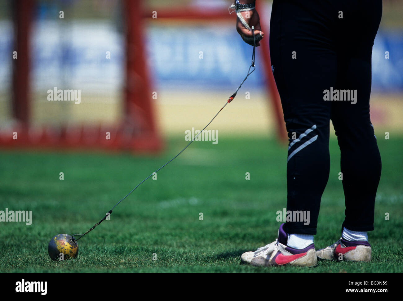 Athlete with a hammer Stock Photo - Alamy