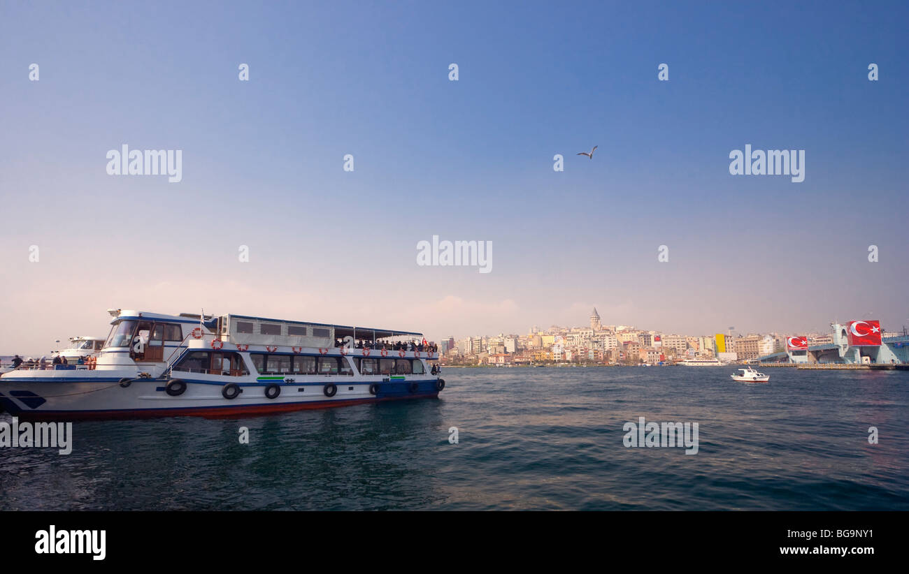 Ferry in Istanbul - Cityscape with Galata Tower and Galata Bridge in ...
