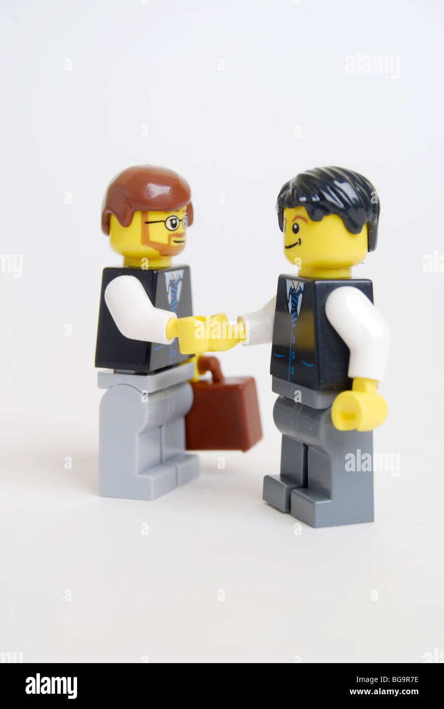 Business people Business men handshake deal agreement lego men smiling ...