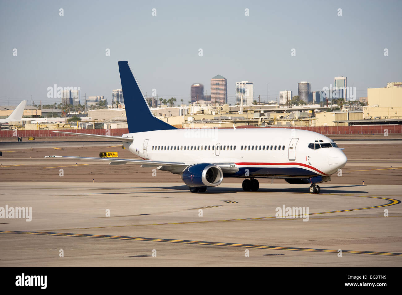 A generic plane on an airport runway gets ready to take off Stock Photo ...