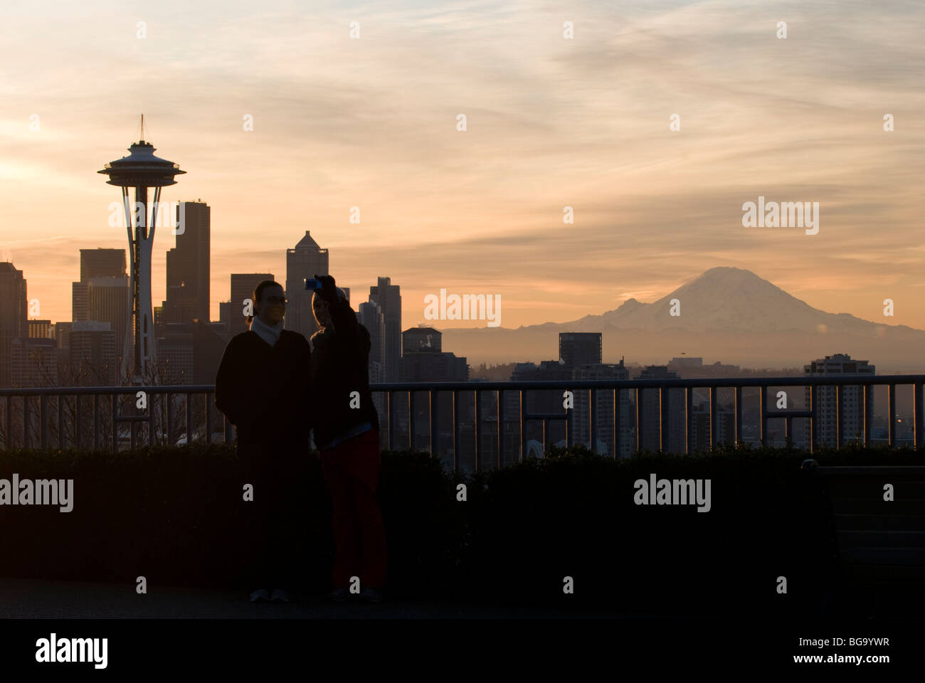 Two women enjoy the view of downtown Seattle from Kerry Park Stock ...