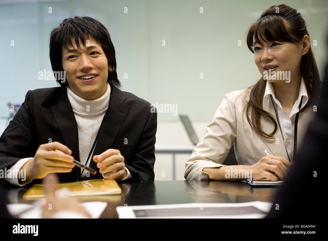 Two people meeting at table Stock Photo - Alamy