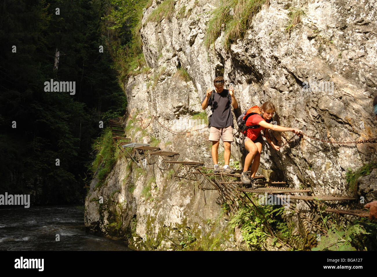 Walkers on the iron walkways in the Hornad River Canyon Slovensky Raj ...