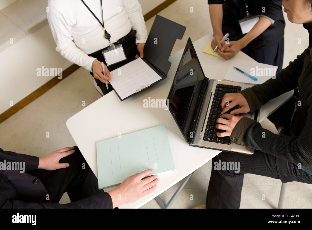 Human hands on table Stock Photo - Alamy