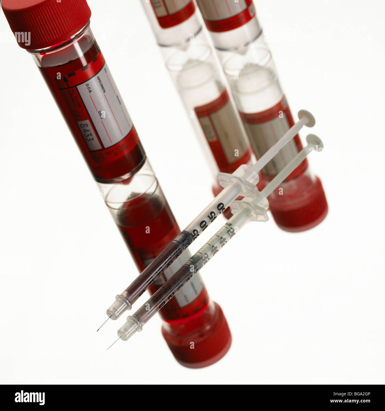 STERILE BLOOD SAMPLE TUBES AND SYRINGE Stock Photo - Alamy