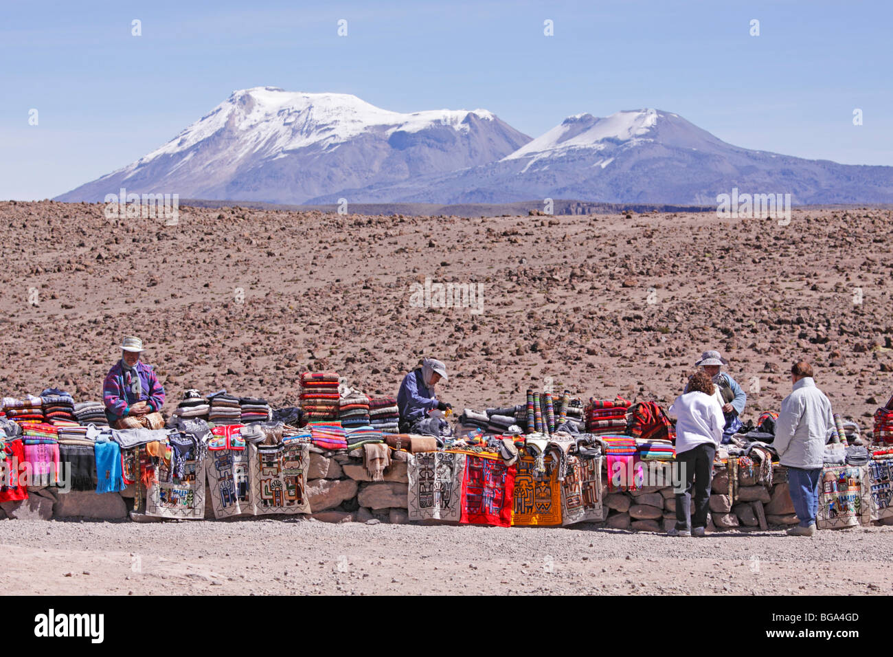 sale of souvenirs in front of volcanoes, Pata Pampa Pass, Cordillera de ...