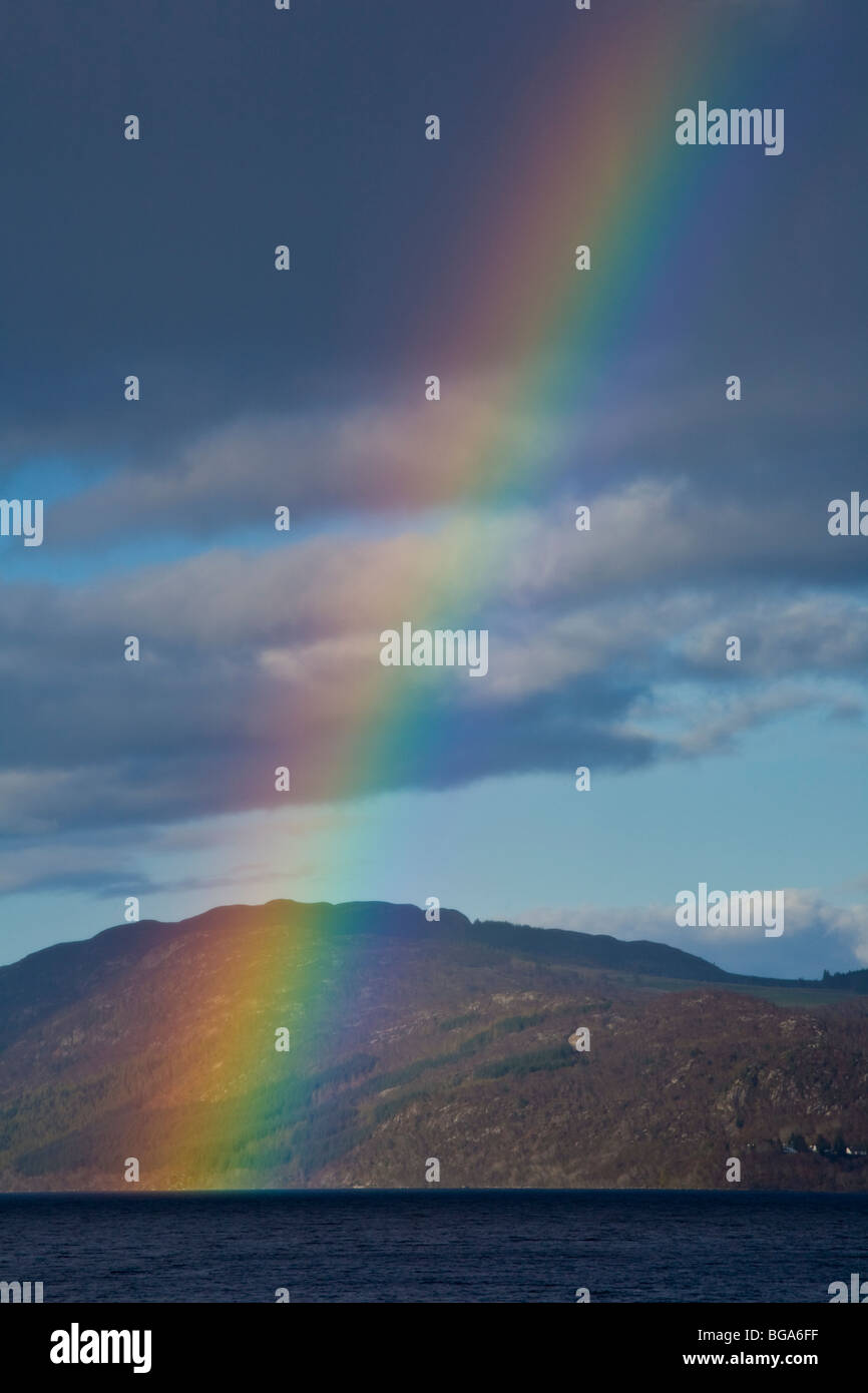 Scotland, Scottish Highlands, Loch Ness. A rainbow over Loch Ness ...