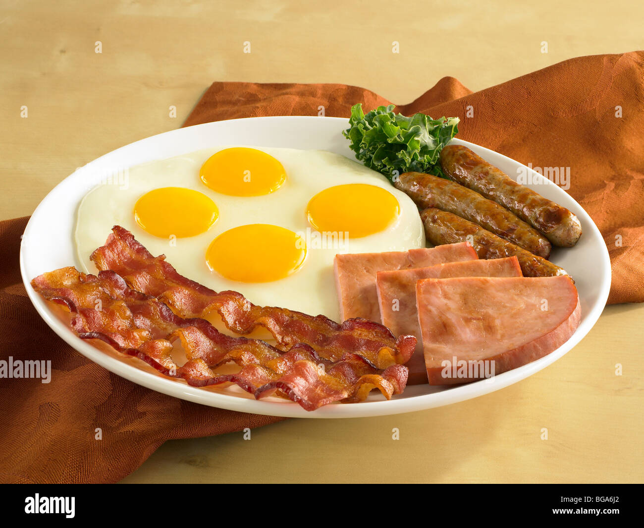 Bacon egg sausage ham breakfast Stock Photo - Alamy