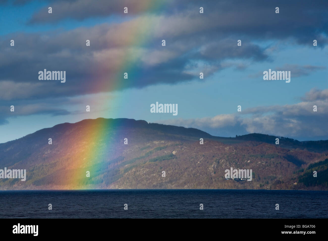 Scotland, Scottish Highlands, Loch Ness. A rainbow over Loch Ness ...