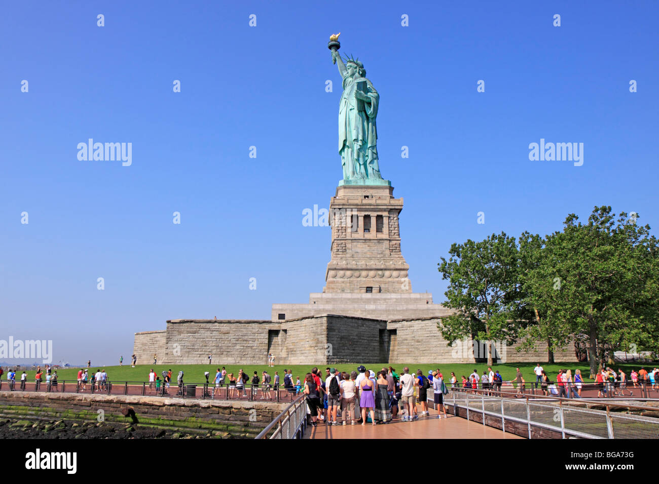 Statue of liberty and some trees hi-res stock photography and images ...
