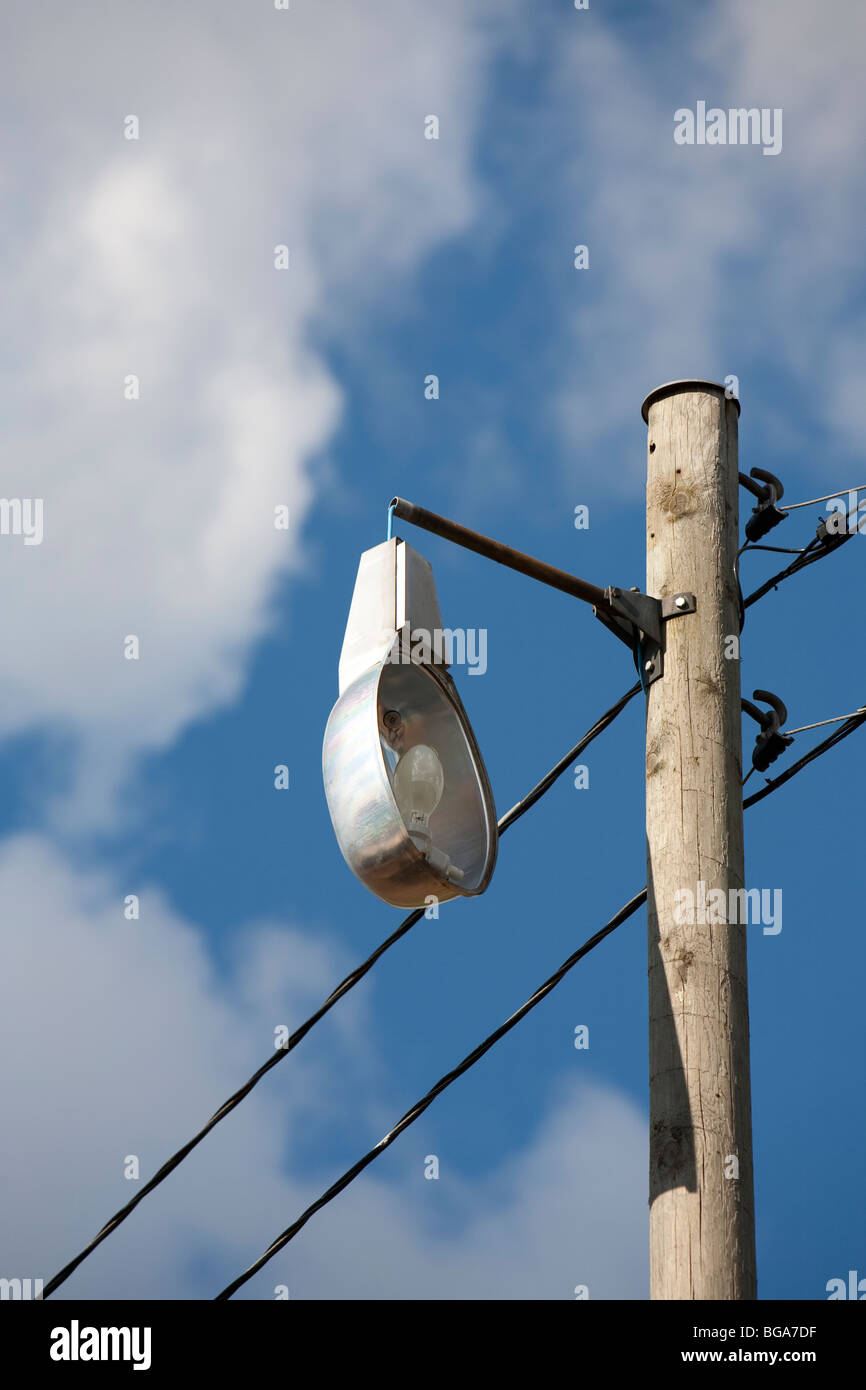 Broken street lamp in a wooden pole Stock Photo - Alamy