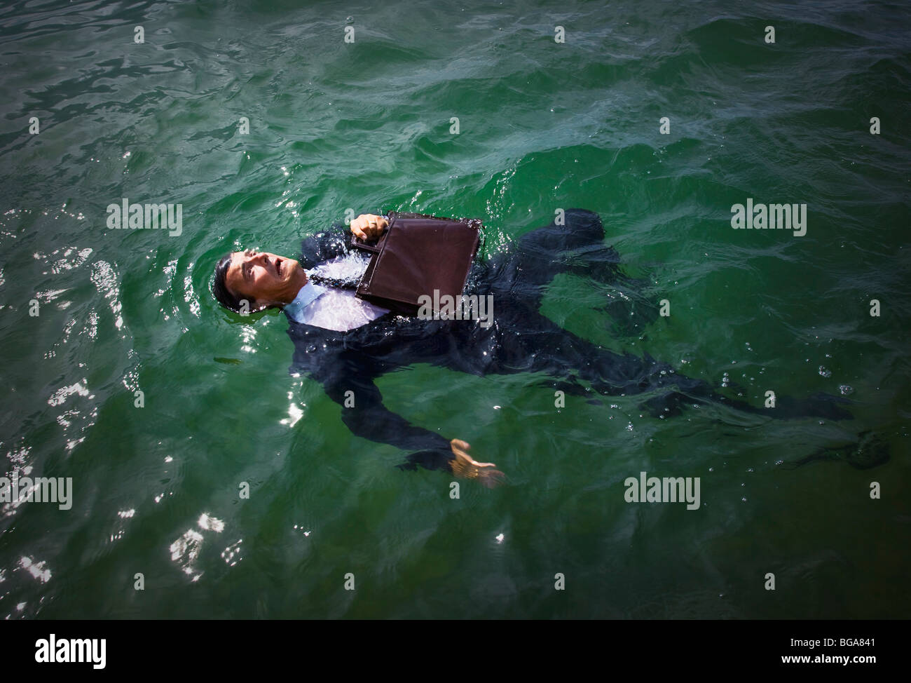 Male body floating in water hi-res stock photography and images - Alamy