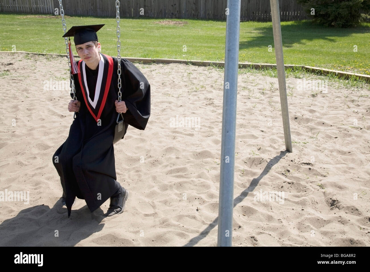 Full length portrait graduate student hi-res stock photography and ...