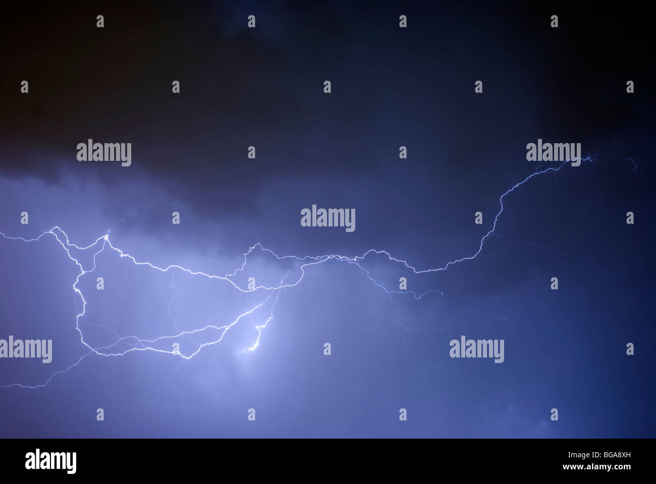 Lightning against black sky with clouds Stock Photo - Alamy