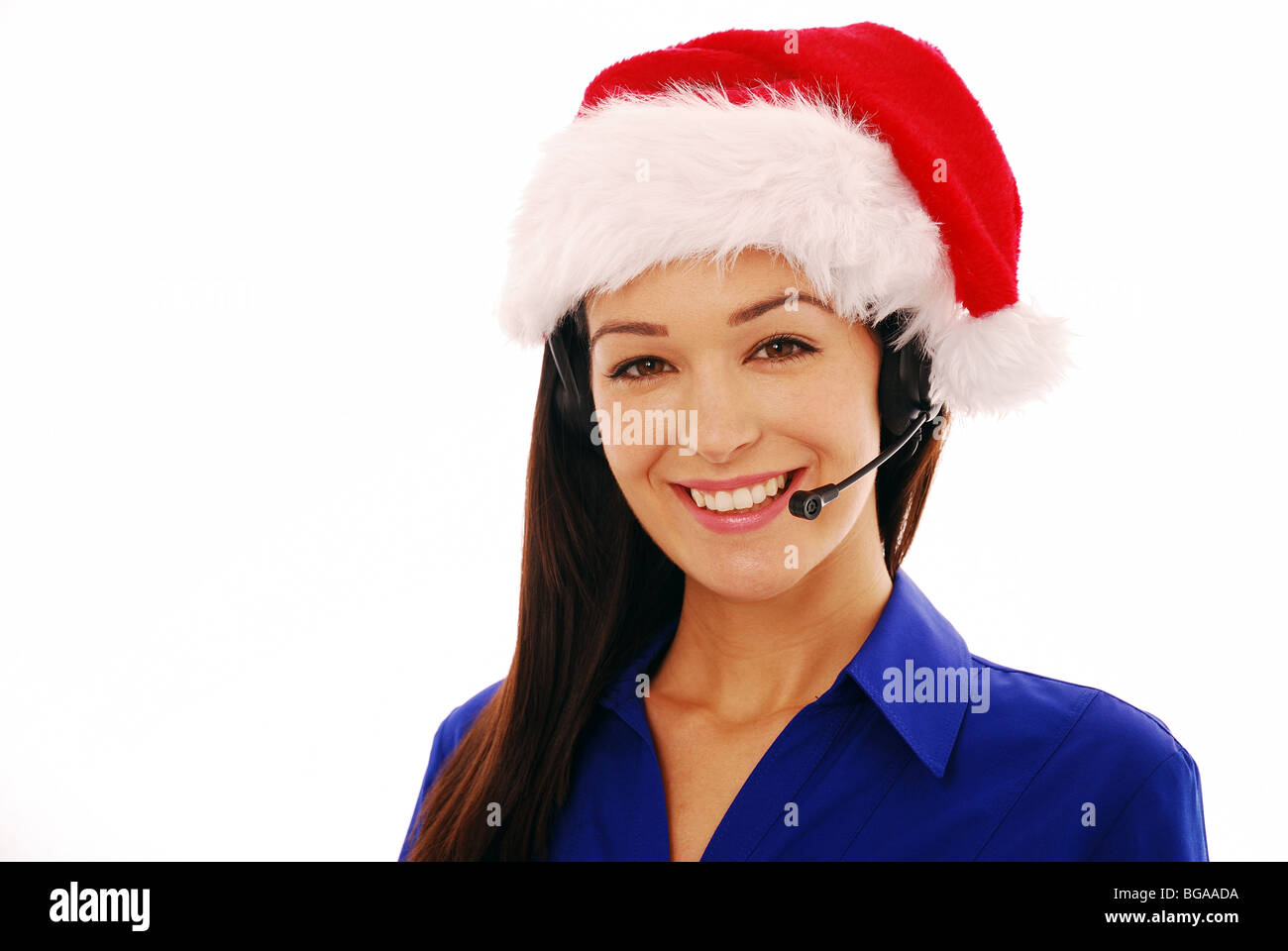 young office worker wearing a Santa hat Stock Photo - Alamy
