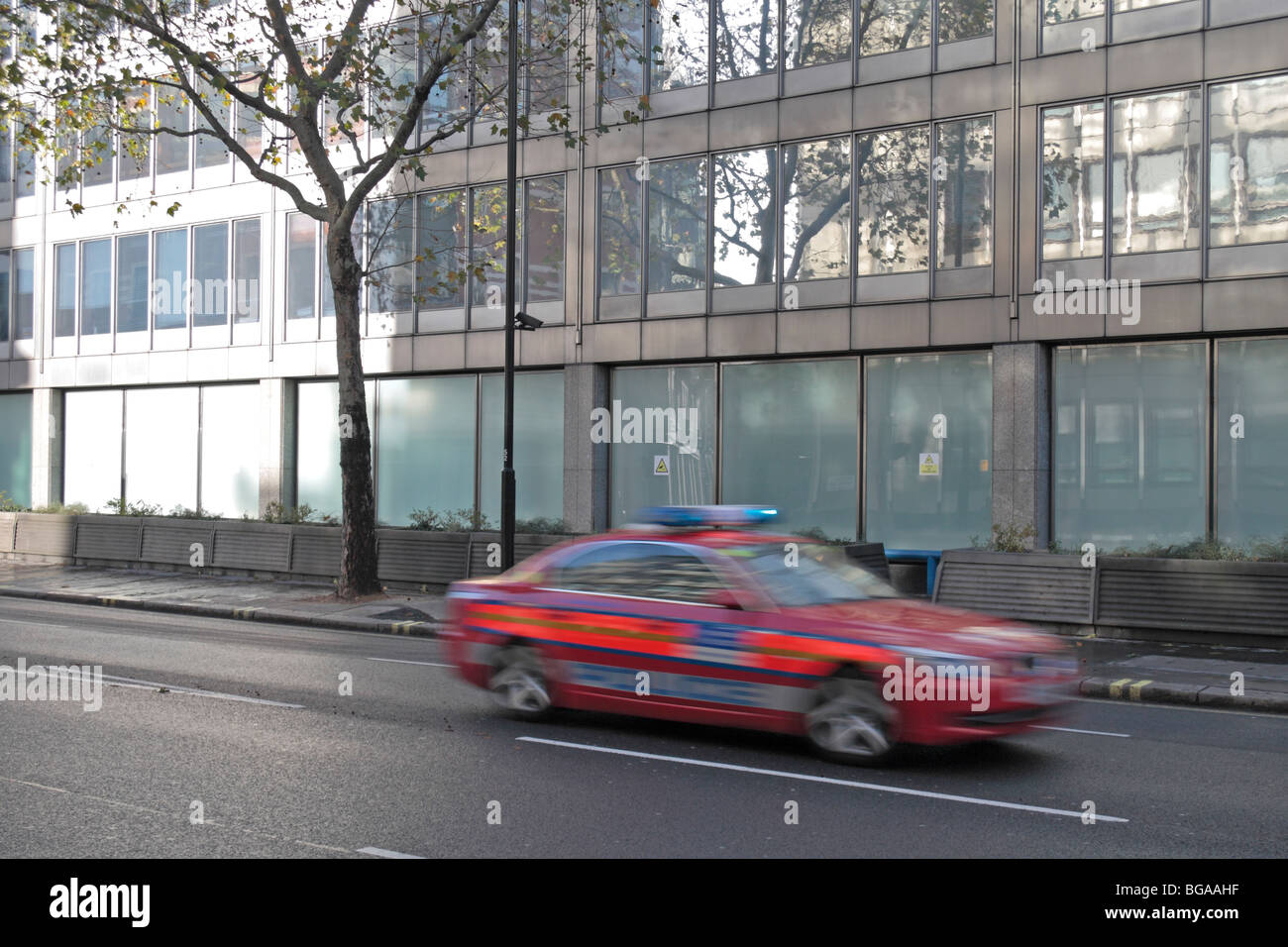 Red police car hi-res stock photography and images - Alamy