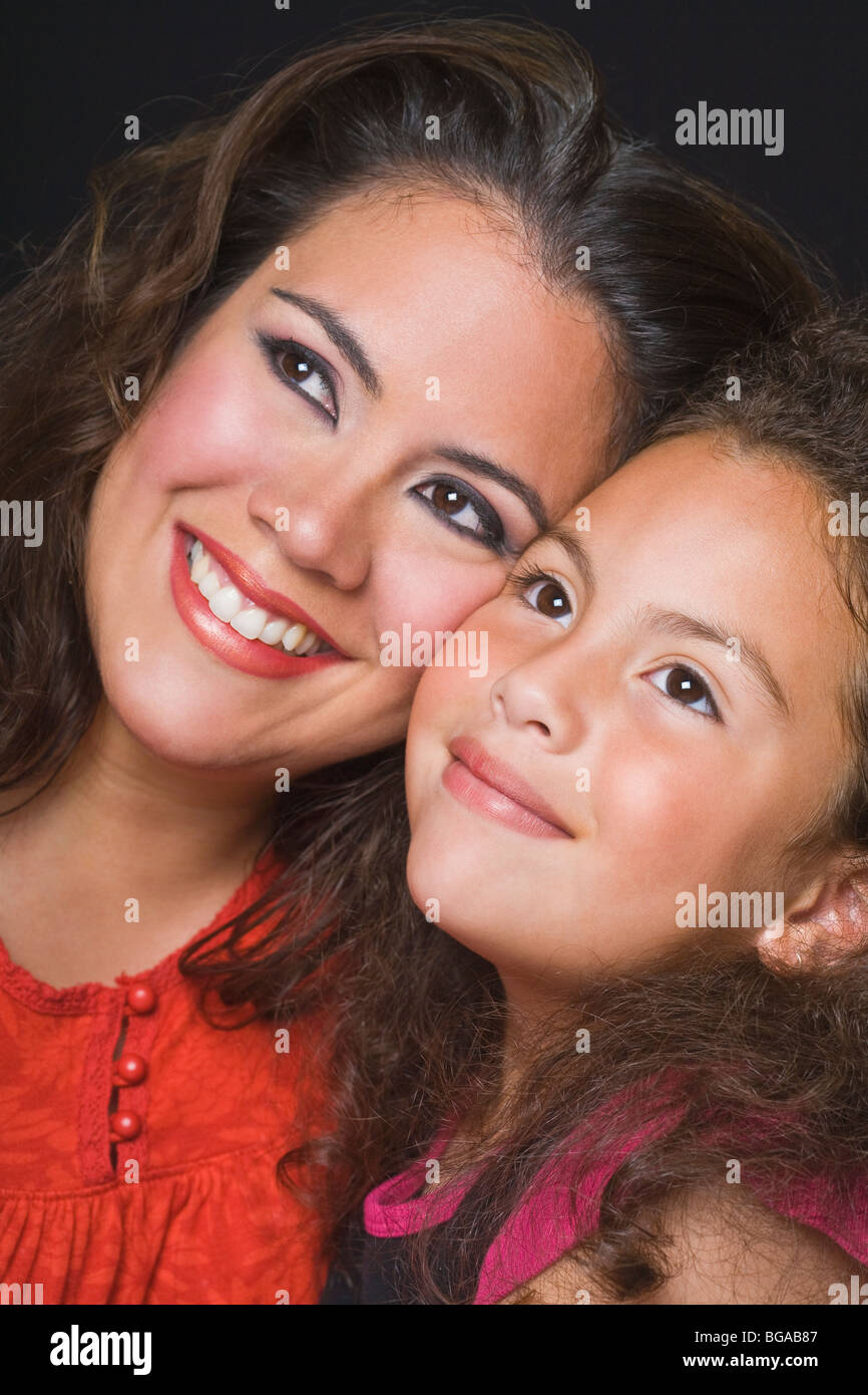 Hispanic mother with daughter, smiling, portrait Stock Photo - Alamy