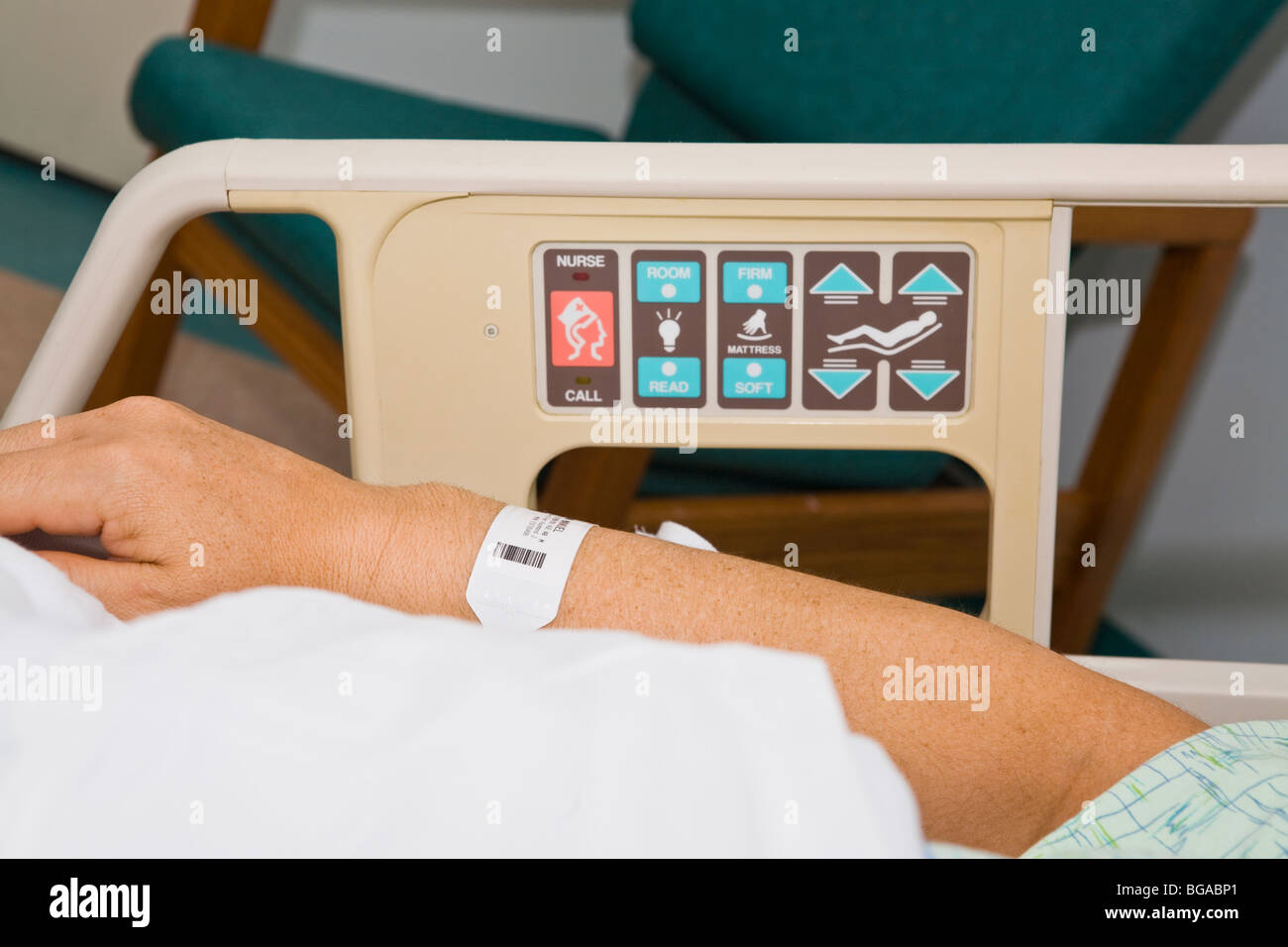 Detail of arm of man in hospital bed Stock Photo - Alamy