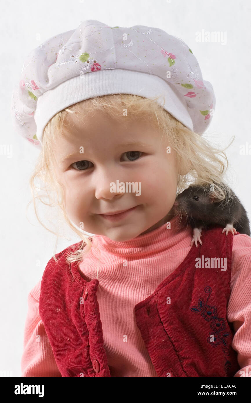 close-up portrait of happy baby with rat on white background Stock ...