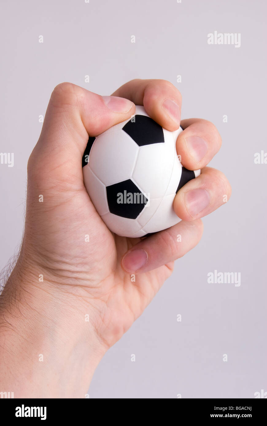 Hand gripping ball hi-res stock photography and images - Alamy