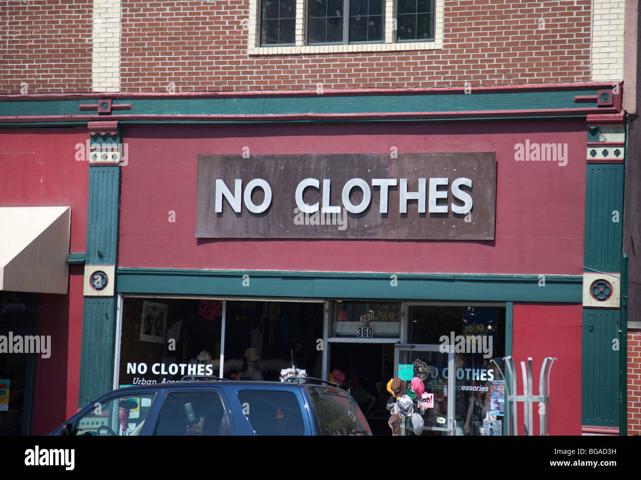 Clothes store selling no clothes Stock Photo - Alamy