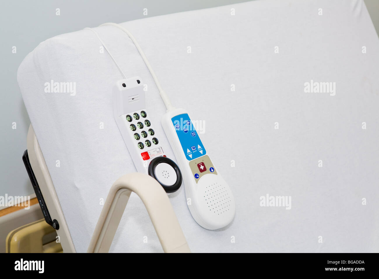 Hospital bed with telephone and TV control Stock Photo - Alamy