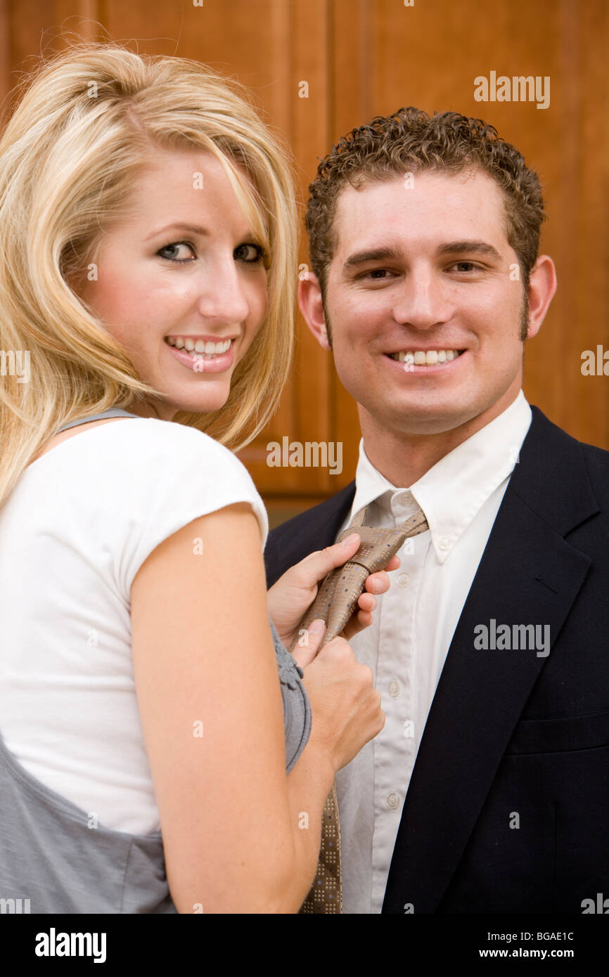 A young couple at home get ready for the workday Stock Photo - Alamy