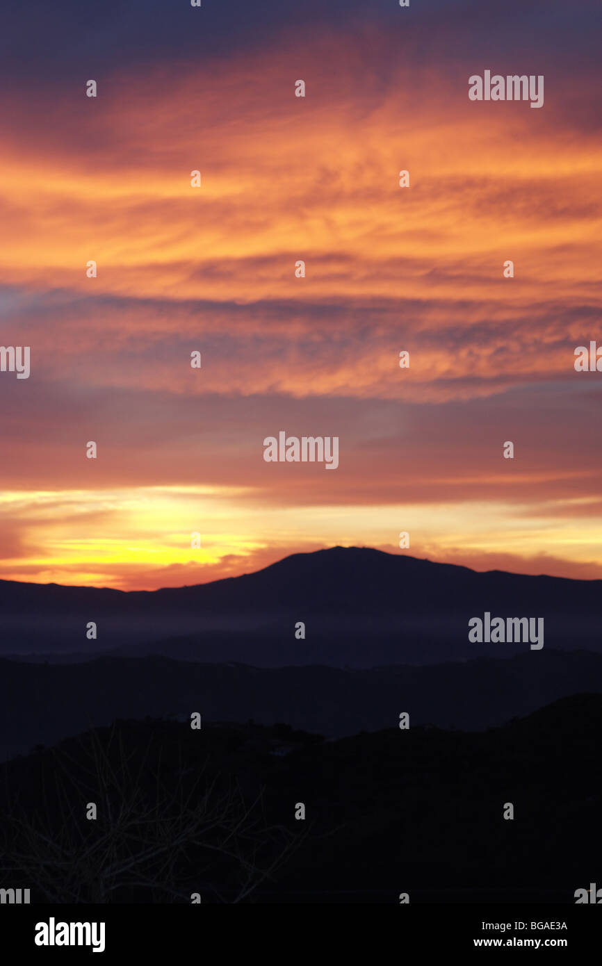 Sun set with colourful colorful sky Stock Photo - Alamy