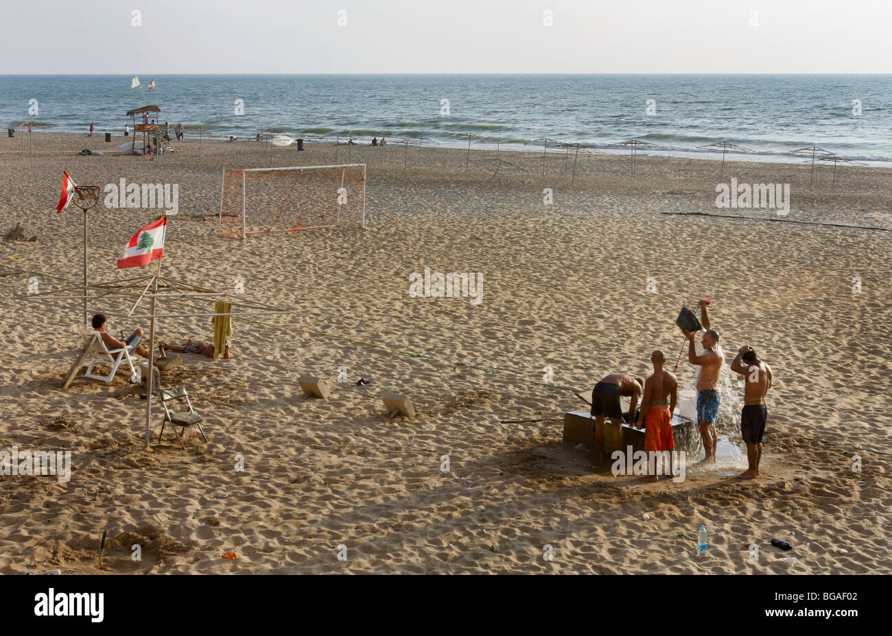 People enjoy a summer day at the Rawcheh beach in Beirut in Lebanon ...