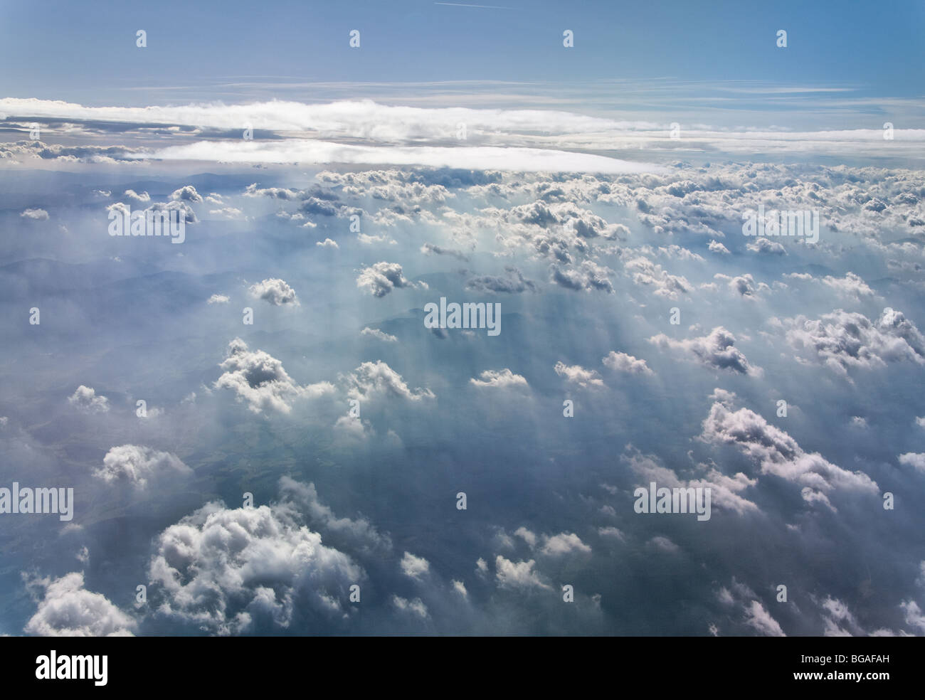 Over clouds. View from airplanes window Stock Photo - Alamy