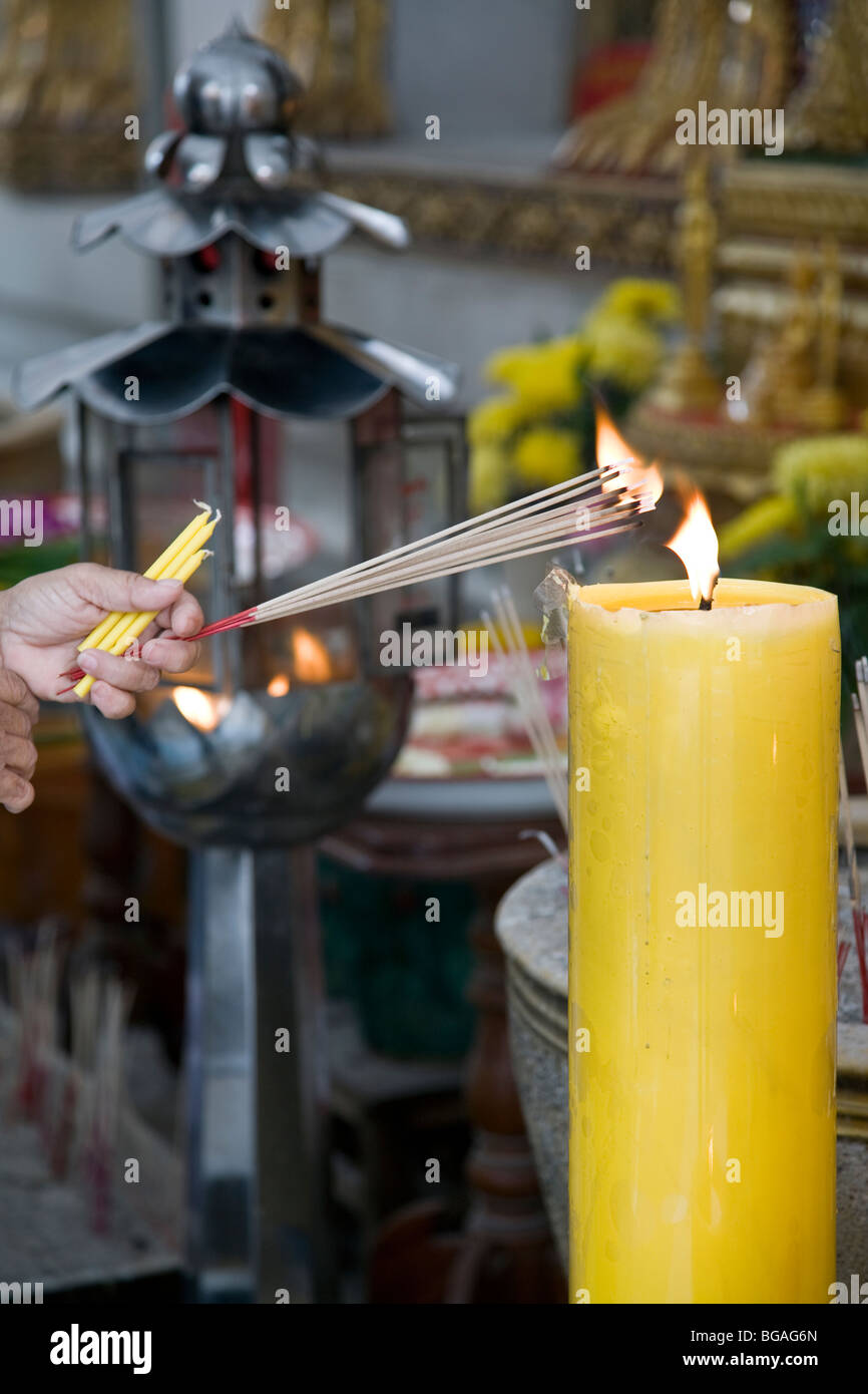 Lighting incense sticks bangkok hi-res stock photography and images - Alamy